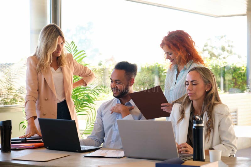 Multiethnic Business People Working Together in the Office. Stock Image ...