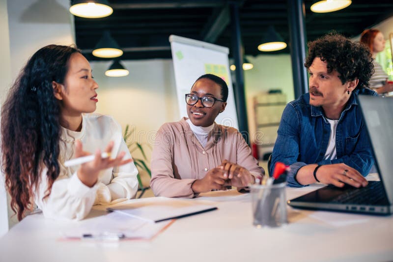 Multiethnic Coworkers Talking Serious Topics Their Office Stock Photos ...