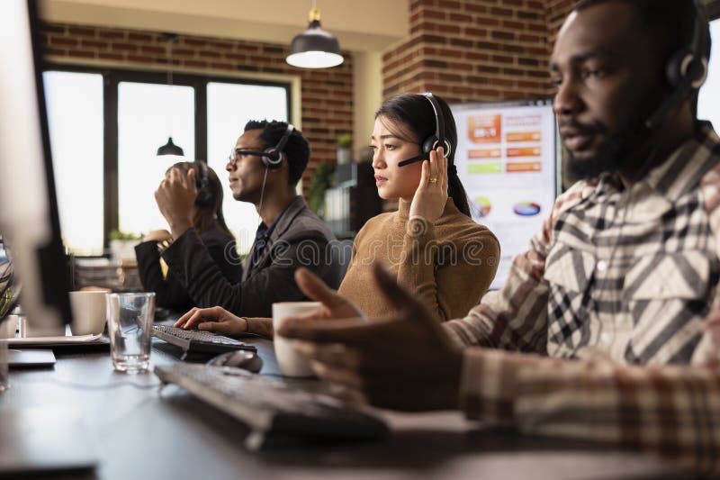 Multiethnic Customer Support Team at Work Stock Image - Image of scene ...