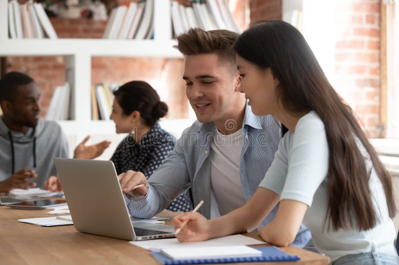 Multiethnic Diverse Students Brainstorm Working on Laptop Stock Image ...