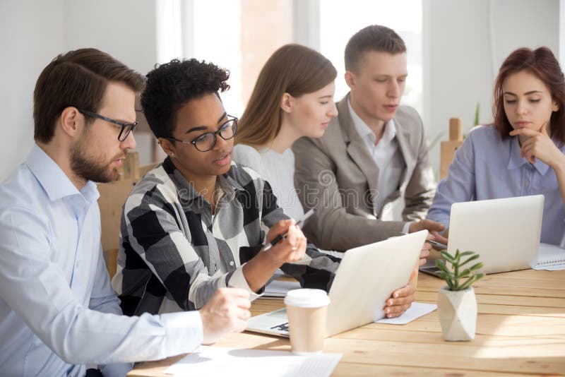 Multiethnic Employees Use Laptops Working in Teams Stock Photo - Image ...