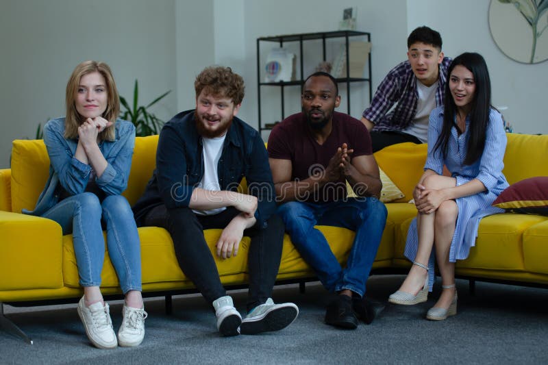 Multiethnic Enthusiastic Team Watching Presentation in Modern Office ...