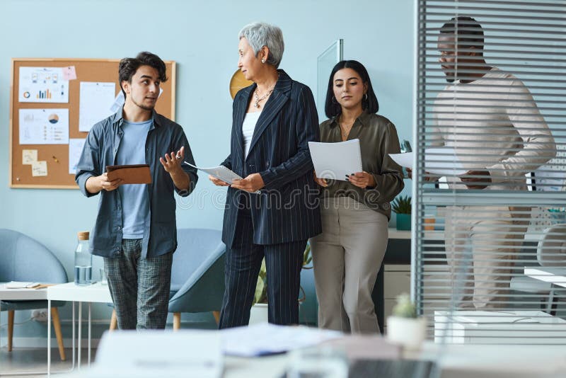 Multiethnic Group of Business People with Female Boss Stock Photo ...