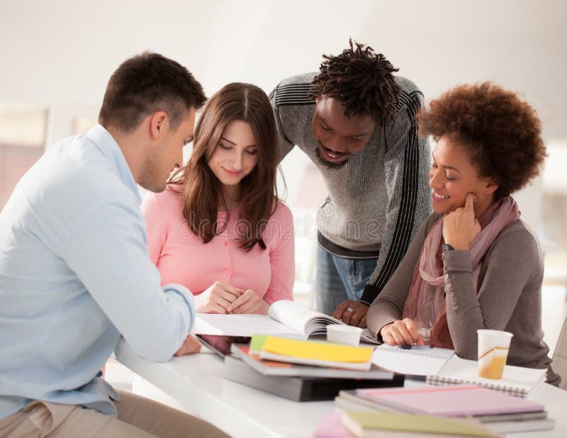Multiethnic Group of College Students Studying Together Stock Image ...