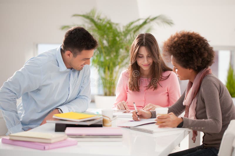 Multiethnic Group of College Students Studying Together Stock Image ...
