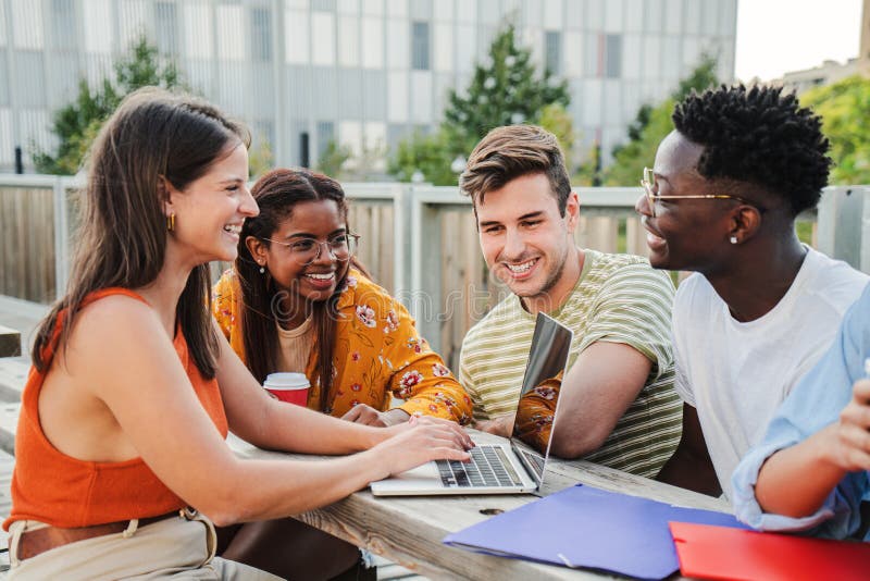 Multiethnic Group of Happy and Smiling Young Students Preparing an Exam ...