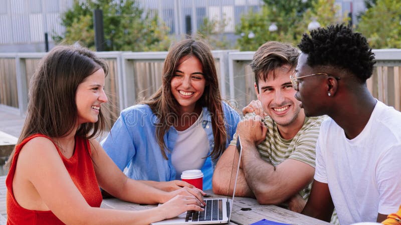 Multiethnic Group of Happy and Smiling Young Students Preparing an Exam ...