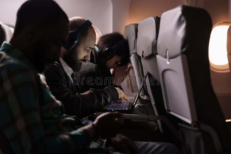 Multiethnic Group of People Flying in Economy Class Together Stock ...