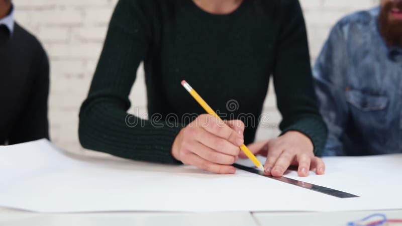 Multiethnic Group of People Working Together Drawing a Plan Using ...