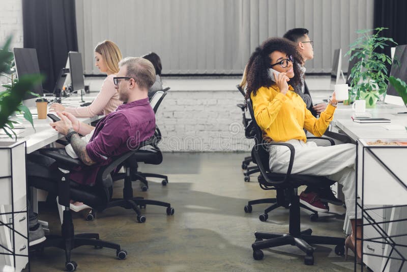 Multiethnic Group of Professional Businesspeople Working with Digital ...