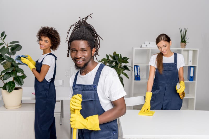 Group of cleaners with mop stock photo. Image of housework - 43862088