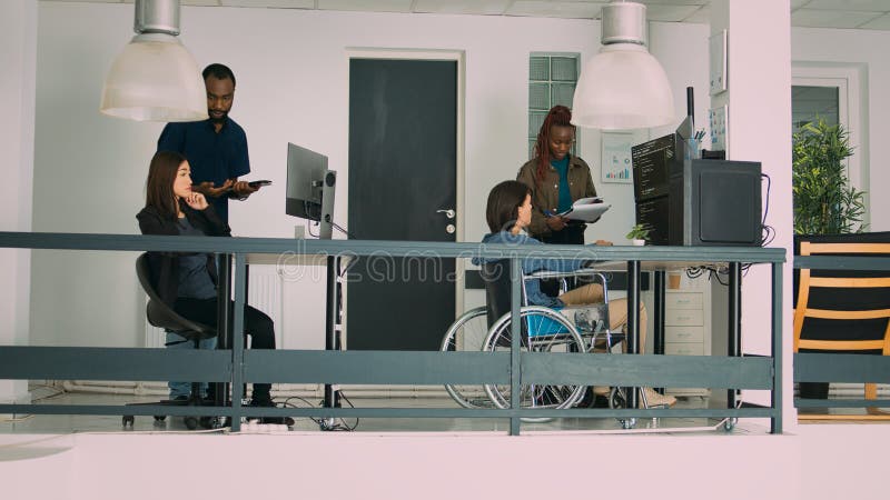 Multiethnic Group Of Programmers Collaborating On It Project To Create Algorithm Stock Image