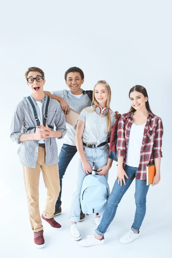 Multiethnic Group of Smiling Students with Backpacks Looking at Camera ...