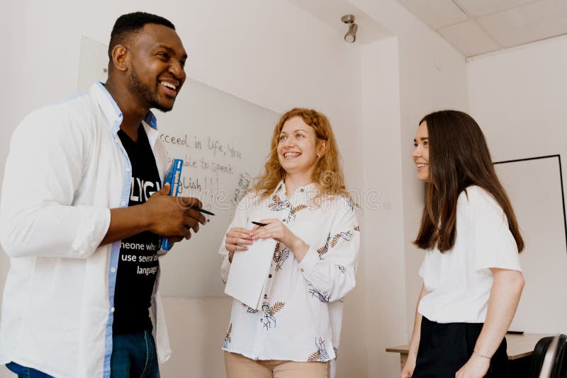 Multiethnic Happy Students and Black Teacher Study Foreign Languages ...