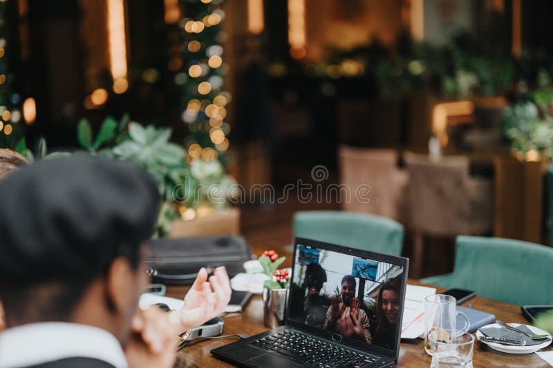 Multiethnic Professionals Collaborate Over a Virtual Meeting in a ...