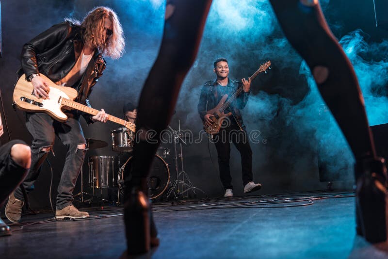 Multiethnic Rock and Roll Band Performing Concert on Stage Stock Image ...