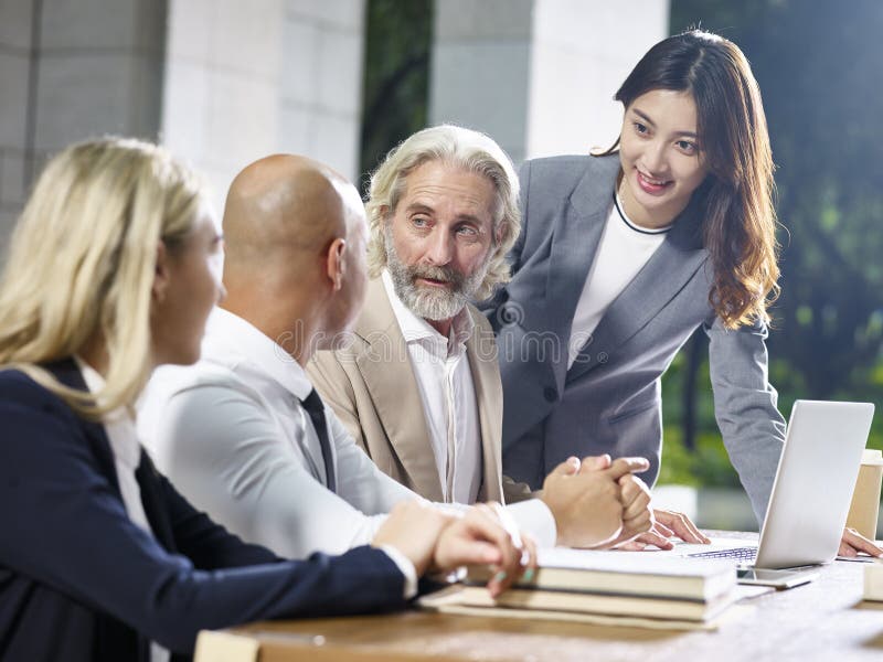Multiethnic Team of Corporate Executives Meeting in Office Stock Image ...