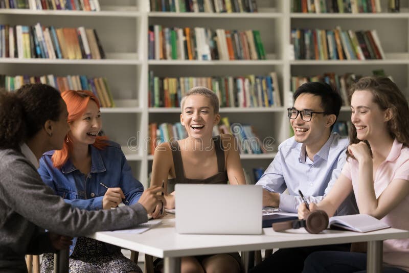 Multiethnic Team of Happy Fresh Students Cooperating on Class Project ...