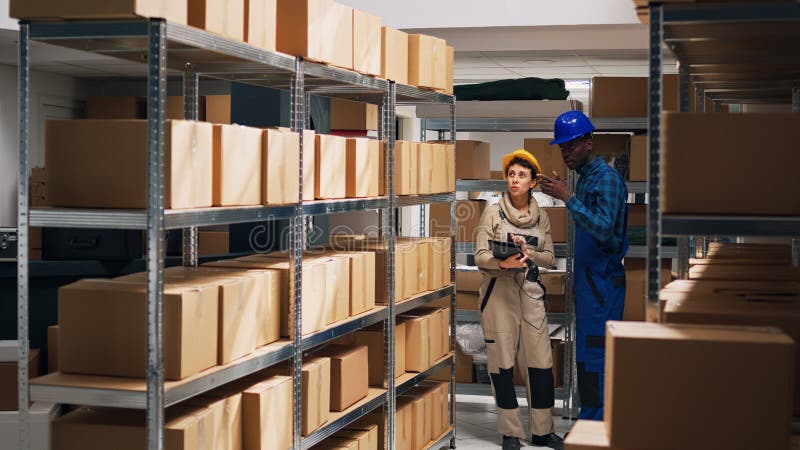 Multiethnic Team of Workers Scanning Barcodes on Boxes Stock Photo ...