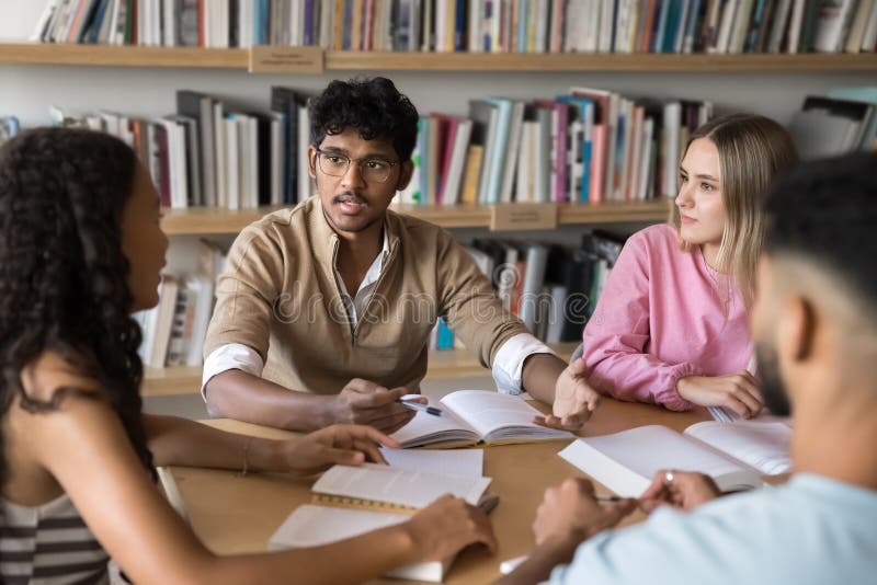Multiethnic University or High-school Students Discussing Projects and ...