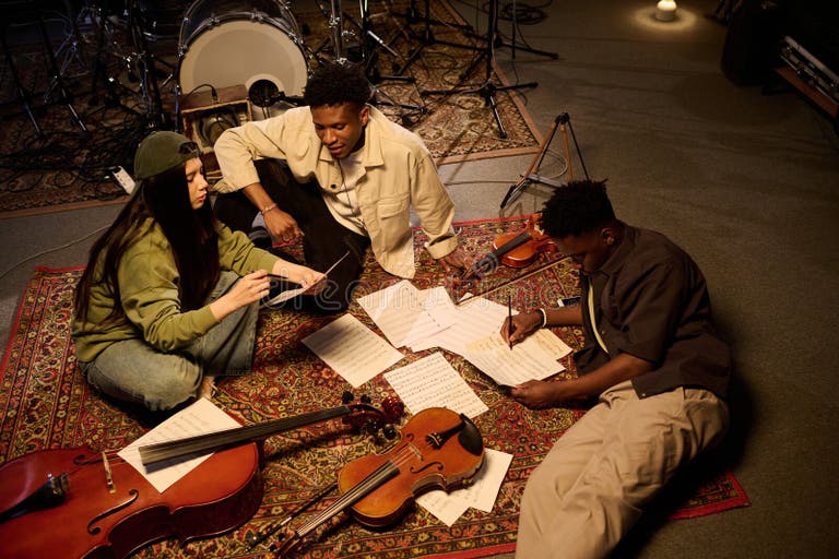 Multiethnic Young Adults Collaborating on Music Composition in Studio ...