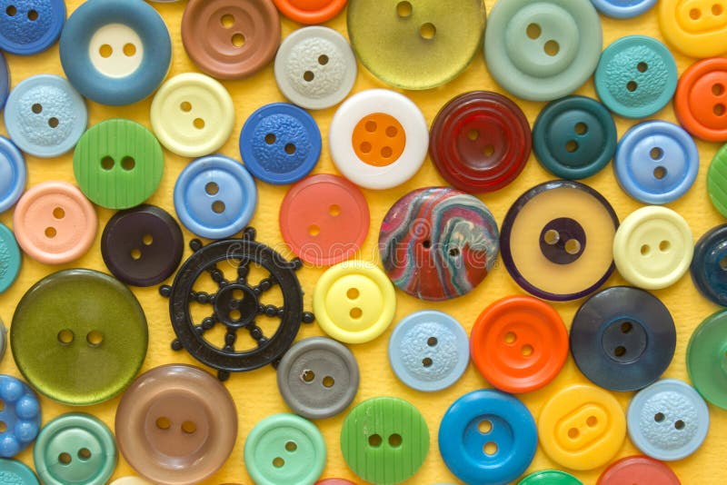 Multifarious Buttons for Clothes on Yellow Stock Photo - Image of helm ...