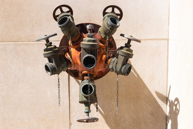 Multifunctional Fire Hydrant in the Wall of a Building on the Street ...