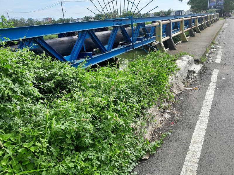 A Multifunctional Pedestrian Bridge is Very Useful for People Passing ...