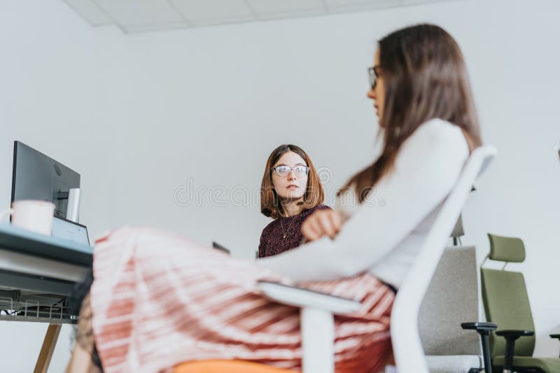 Successful Business Employees Strategizing and Discussing Project ...