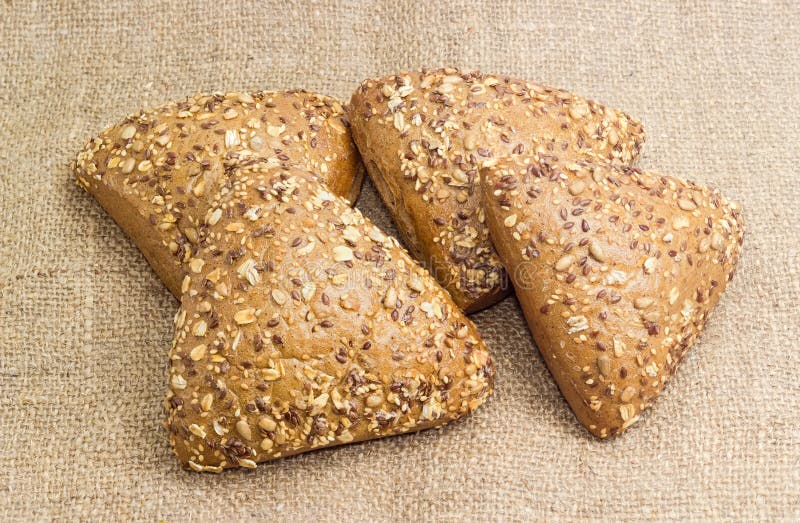Multigrain Buns Sprinkled with Sunflower, Flax and Sesame Seeds Stock ...