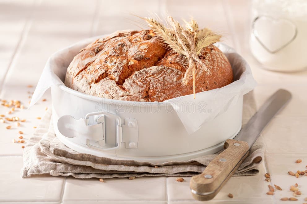 Multigrain Round Loaf Bread Baking with Ears and Grain Stock Image ...