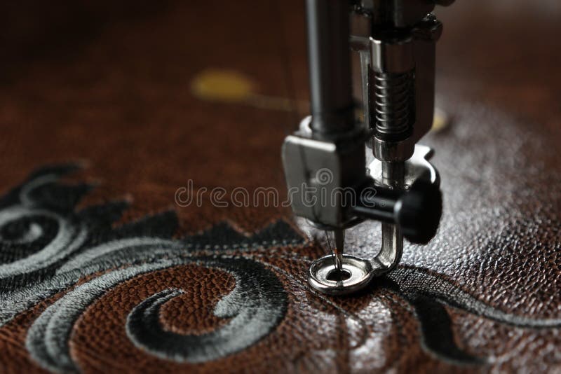 Closeup of Embroidery on Brown Leatherette Stock Photo - Image of ...