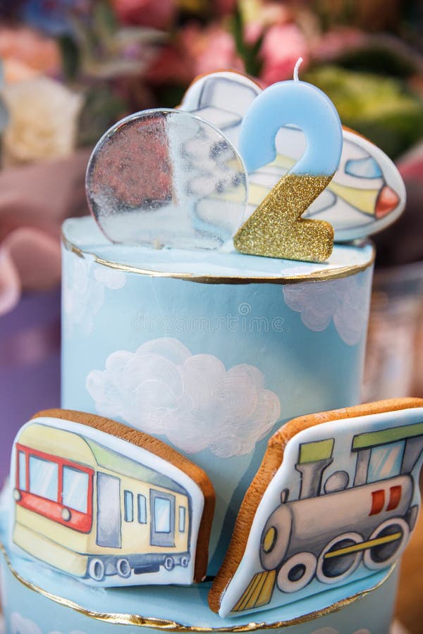 Multilevel Birthday Cake Decorated with Train and Ship Figurines Stock ...