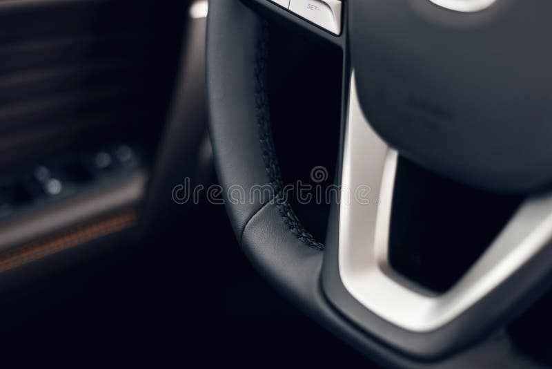 Multimedia Leather Steering Wheel in a Modern Expensive Car. Perforated ...