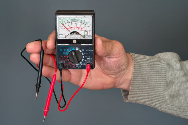 Multimeter in a hand stock photo. Image of male, voltmeter - 24712190