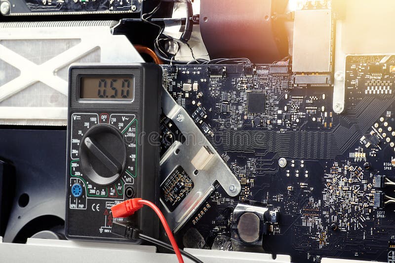 Multi-tester and PC board stock photo. Image of digital - 182129746