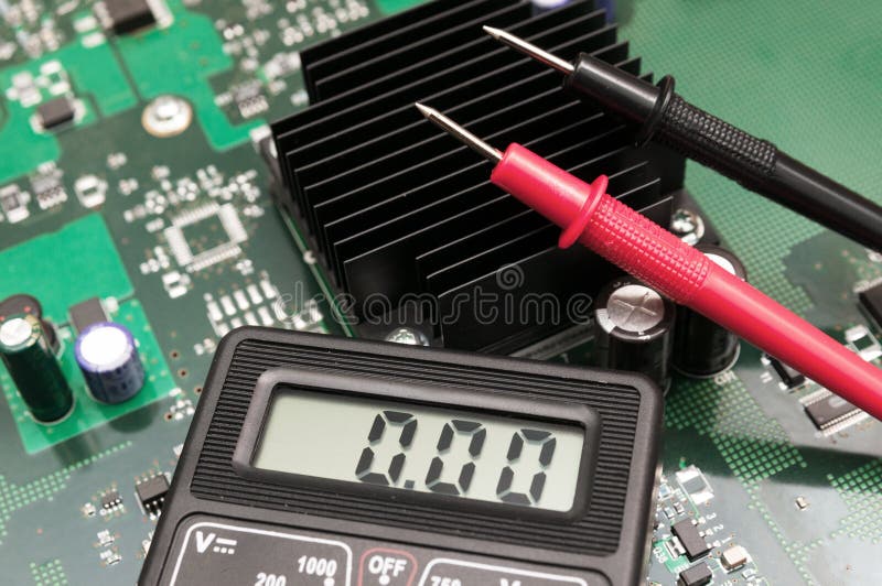 Multimeter on PCB plate. stock photo. Image of equipment - 48154986