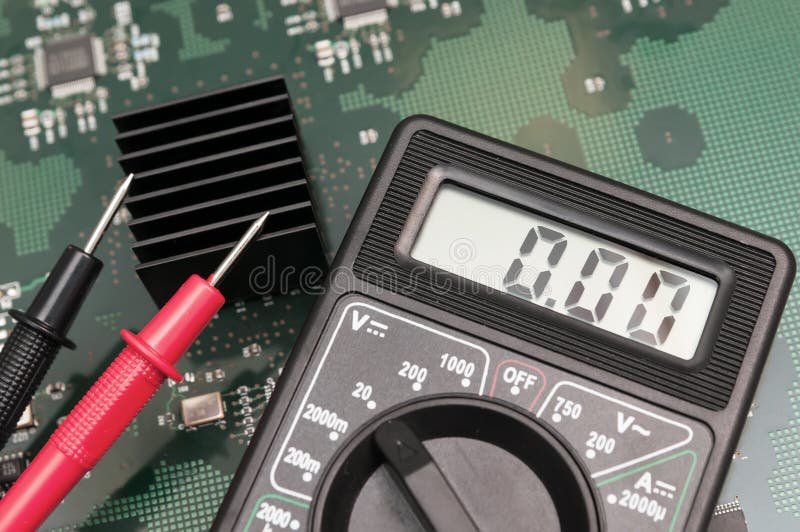 Multimeter on PCB plate. stock image. Image of component - 48154999