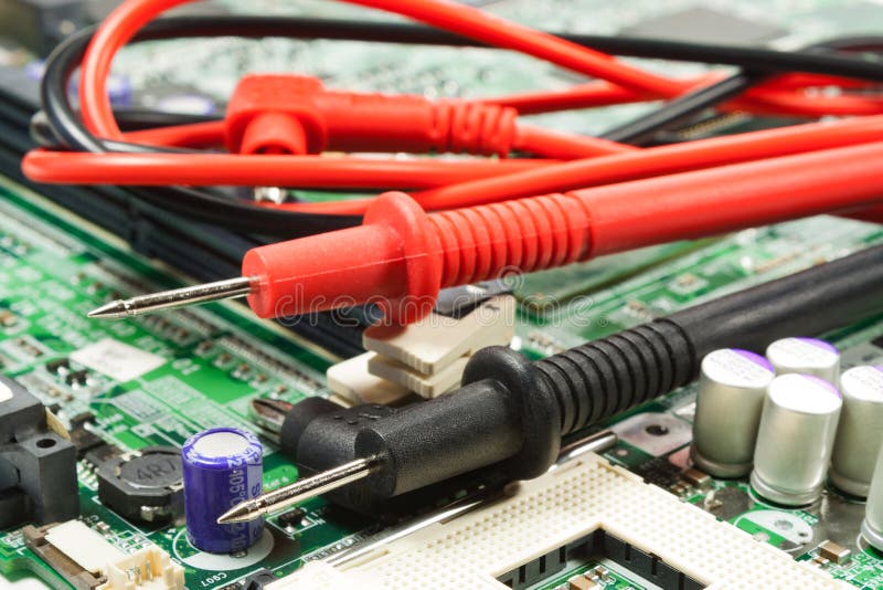 Multimeter Probe on the Motherboard in a Workshop Stock Photo - Image ...