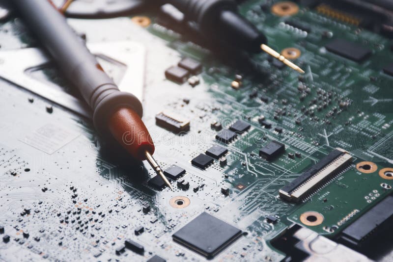 Multimeter Probe Placed on the Motherboard Stock Photo - Image of ...