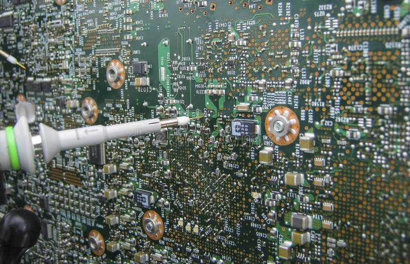 Multimeter Probes Examining a Circuit Board Stock Image - Image of ...