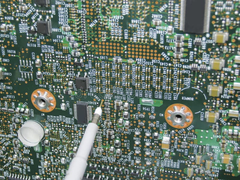 Multimeter Probes Examining a Circuit Board Stock Image - Image of ...