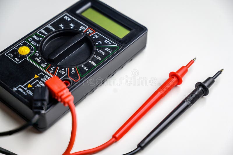 Multimeter and Test Leads on a White Table. a Device for Measuring ...