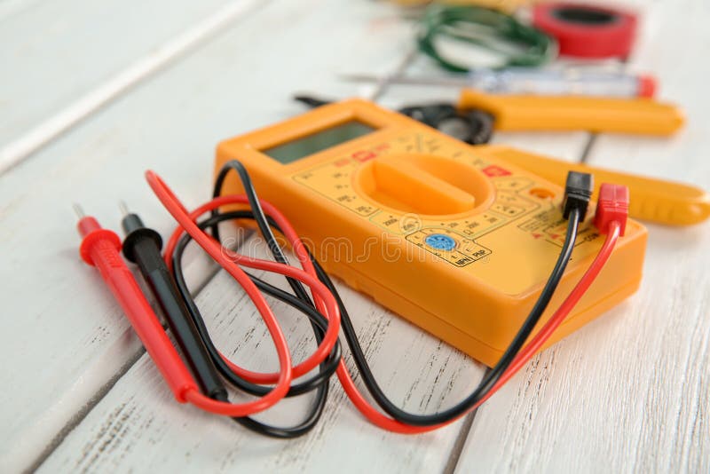 Multimeter on Wooden Table. Electrical Tools Stock Image - Image of ...
