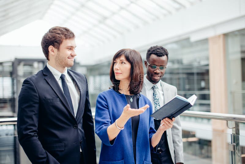 Multinational, Business Team Having Discussion on Note in Office Stock ...