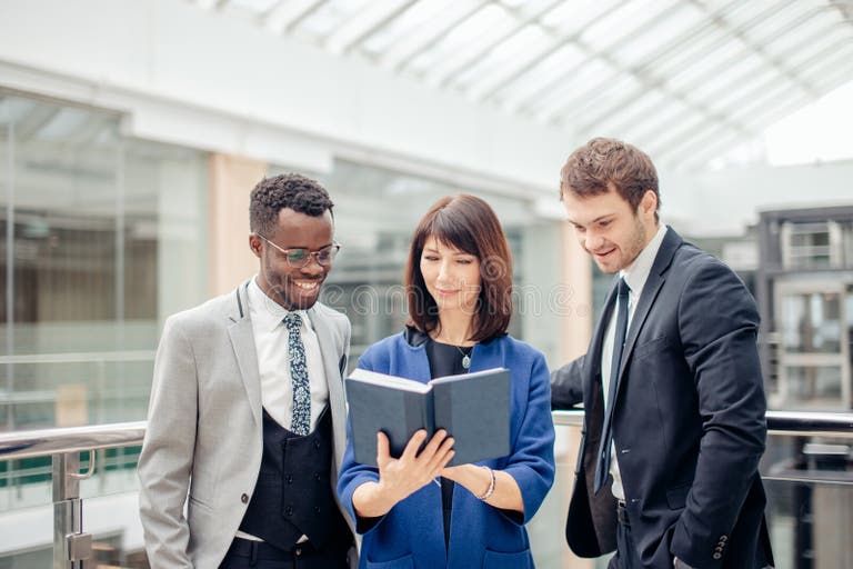 Multinational, Business Team Having Discussion on Note in Office Stock ...