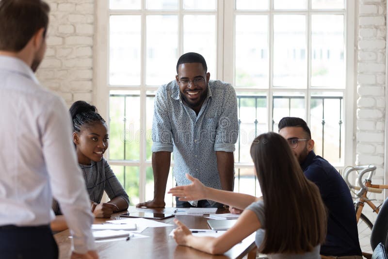 Multinational Creative Positive Team Thinking Working on Project ...