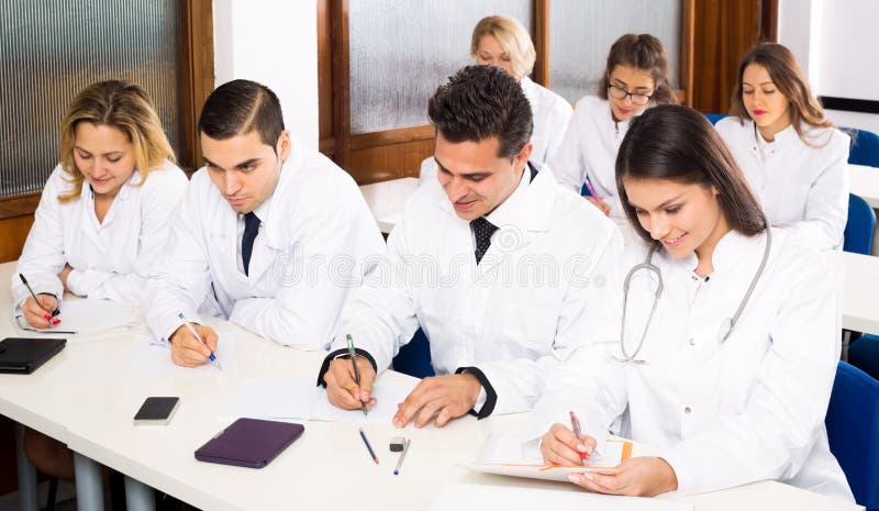 Professor Having Discussion with College Students Stock Photo - Image ...