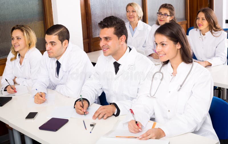Professor Having Discussion with College Students Stock Photo - Image ...