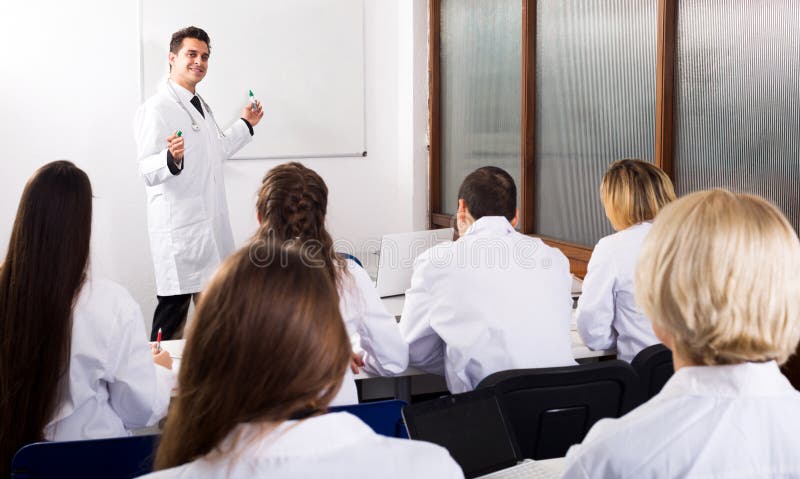 Professor Having Discussion with College Students Stock Photo - Image ...